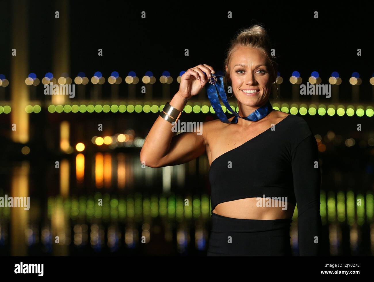 Erin Phillips of the Crows poses for a photo after winning the Best and Fairest Award during the ...