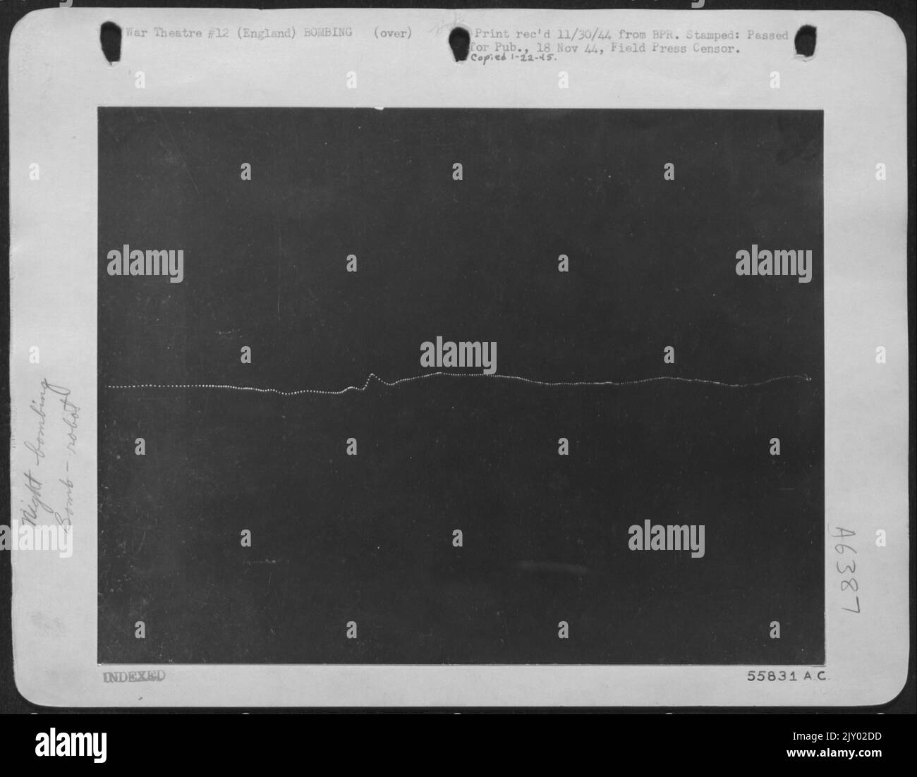 Setting up a time-exposure and then observing the flight of the bomb ...