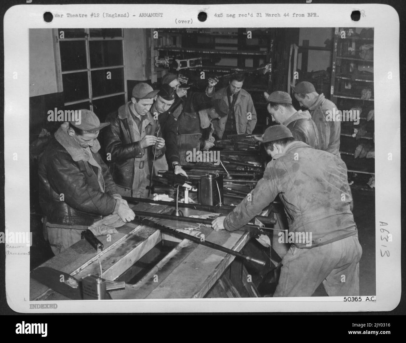 Armament crew cleans barrels and receivers of 50 calibre guns in ...