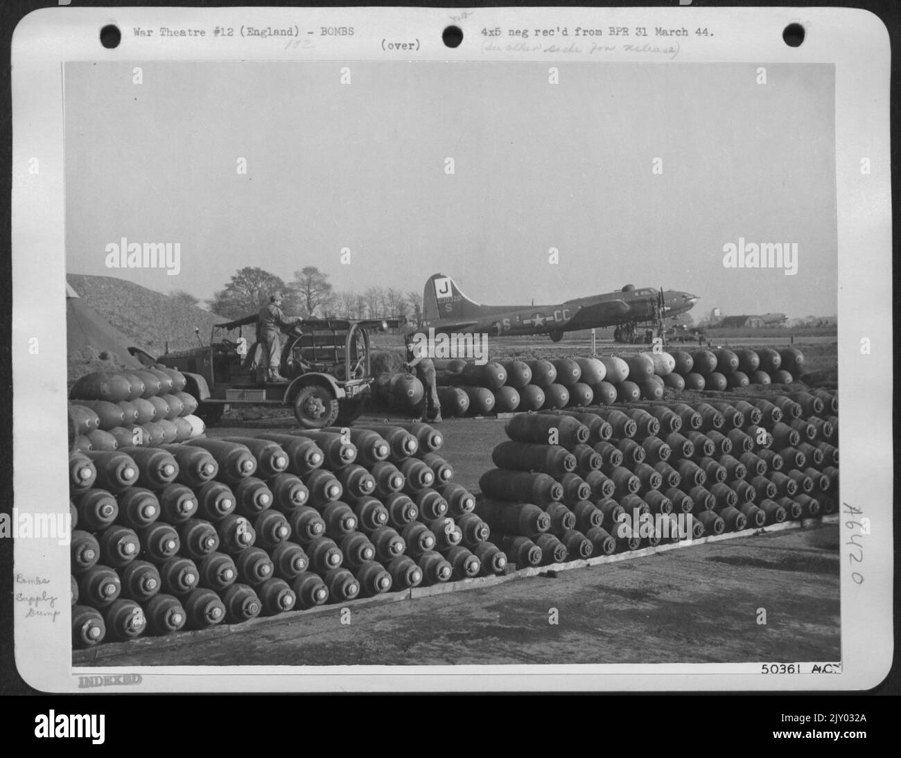 Reserve stores of a large variety of high explosive bombs are stacked ...