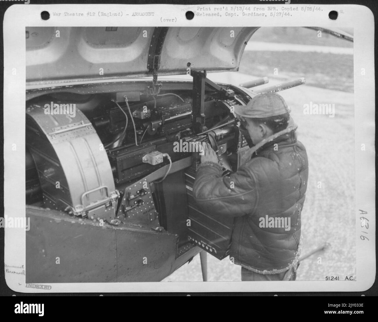 Cpl. Thomas B. ofrd of Anderson, S. Carolina, armorer, loading P-38 ...