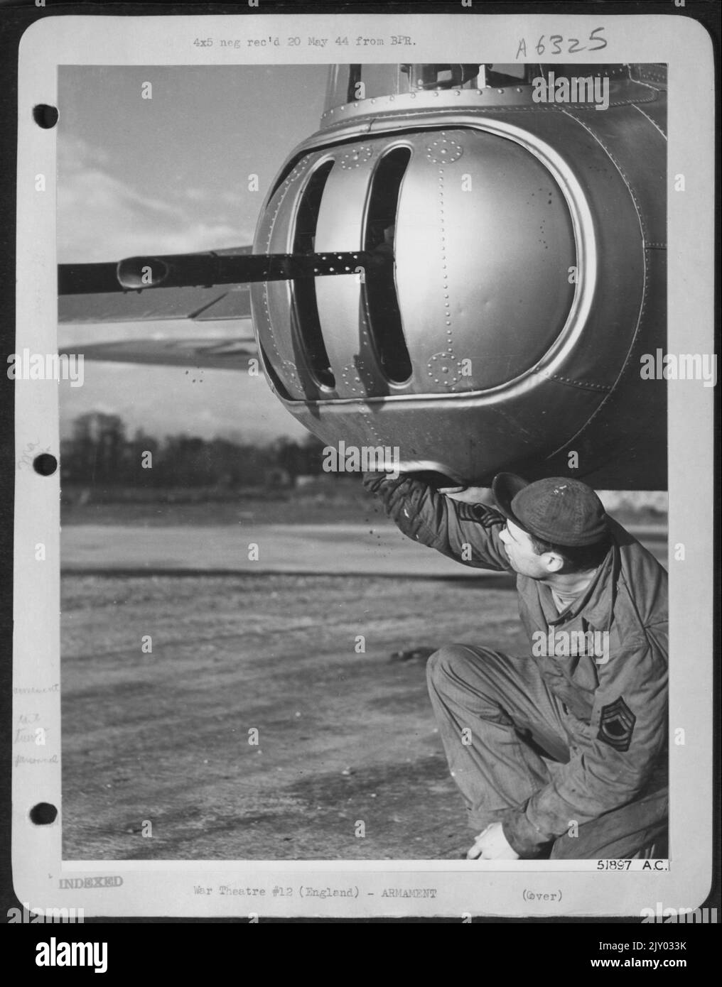 NEW TAIL TURRET--Crew Chief M/Sgt. Wm. A. Lucas of Ashland, Wisc ...