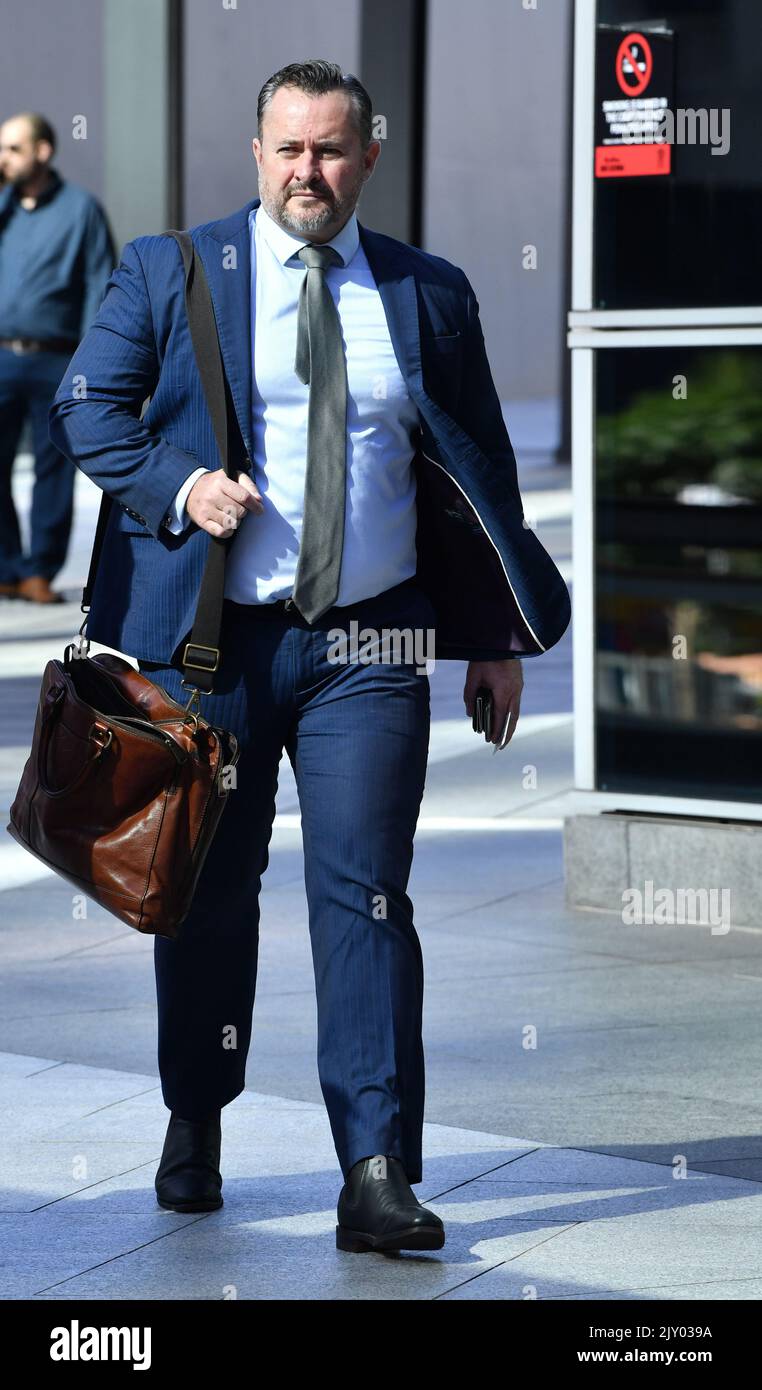 Lawyer Adam Magill is seen arriving at the Brisbane Magistrates Court ...