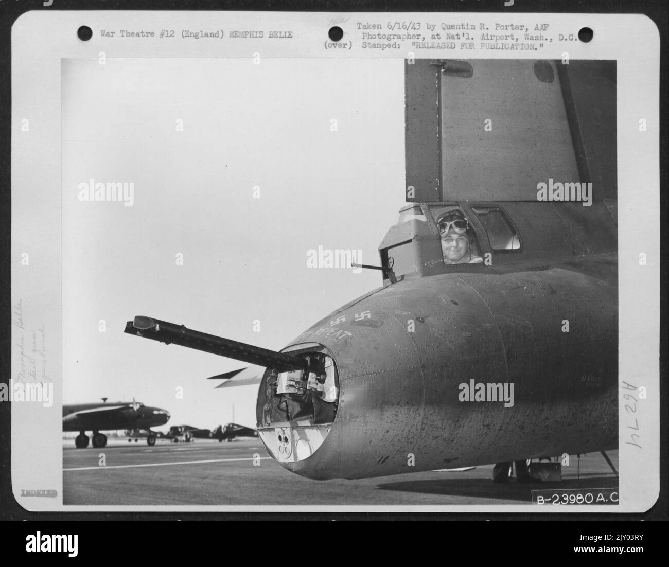 S/Sgt. John P. Quinlan, 248 Truman Ave., Yonkers, N.Y., in his tail gun ...