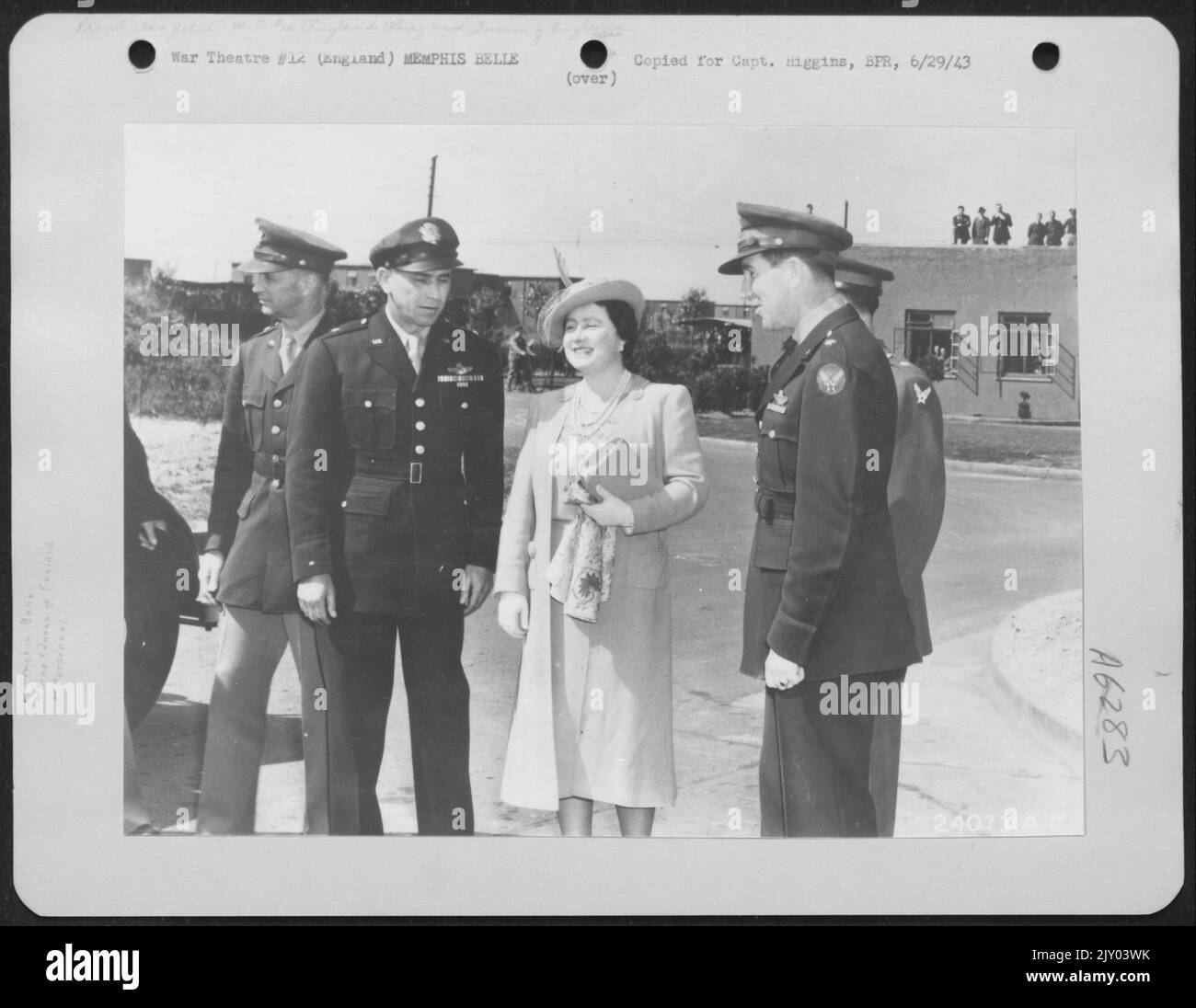 Queen Elizabeth of England visits an Eight Air force base to inspect ...
