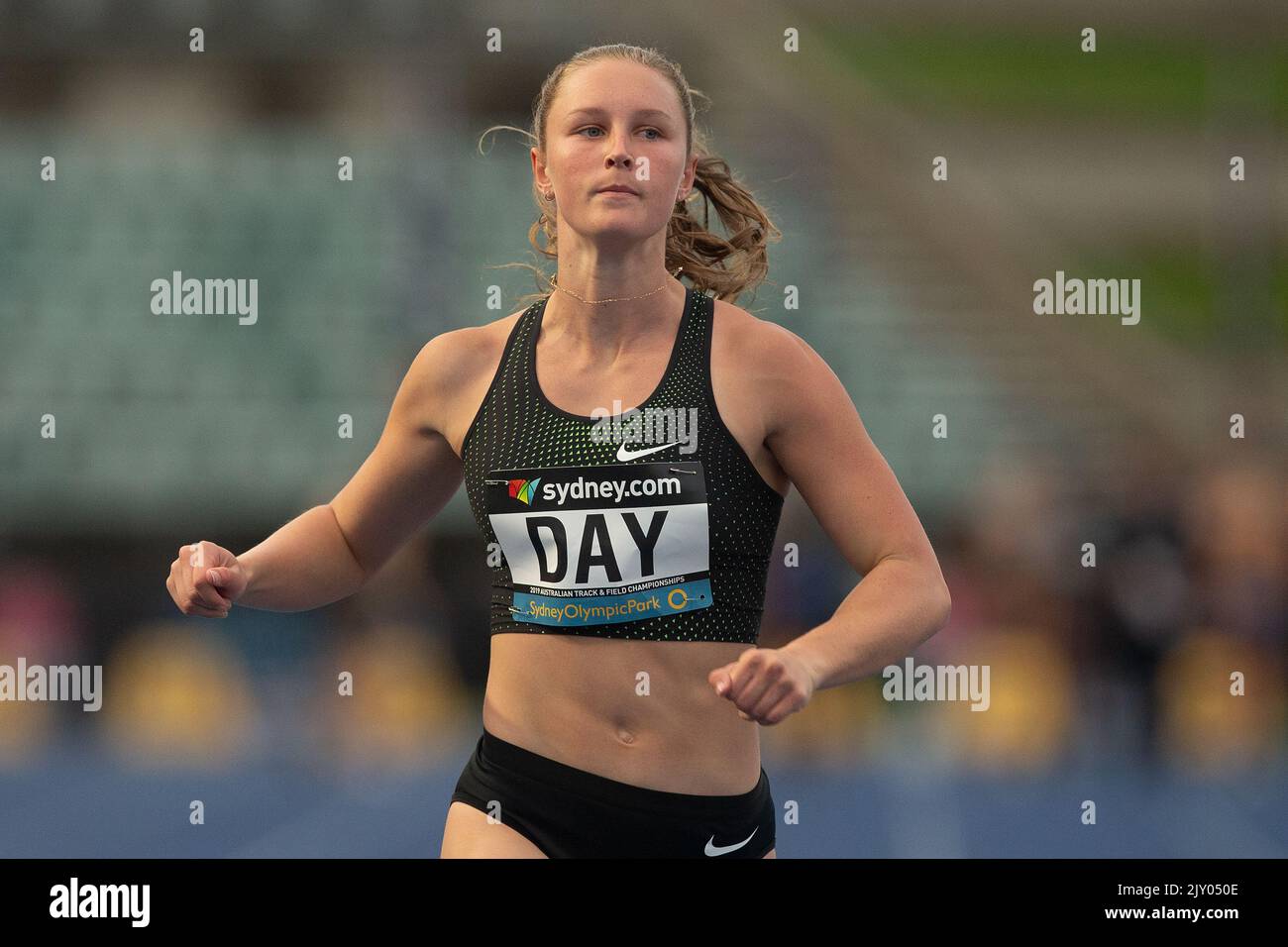 Riley Day from Queensland runs in her heat of the Women's 100m during ...