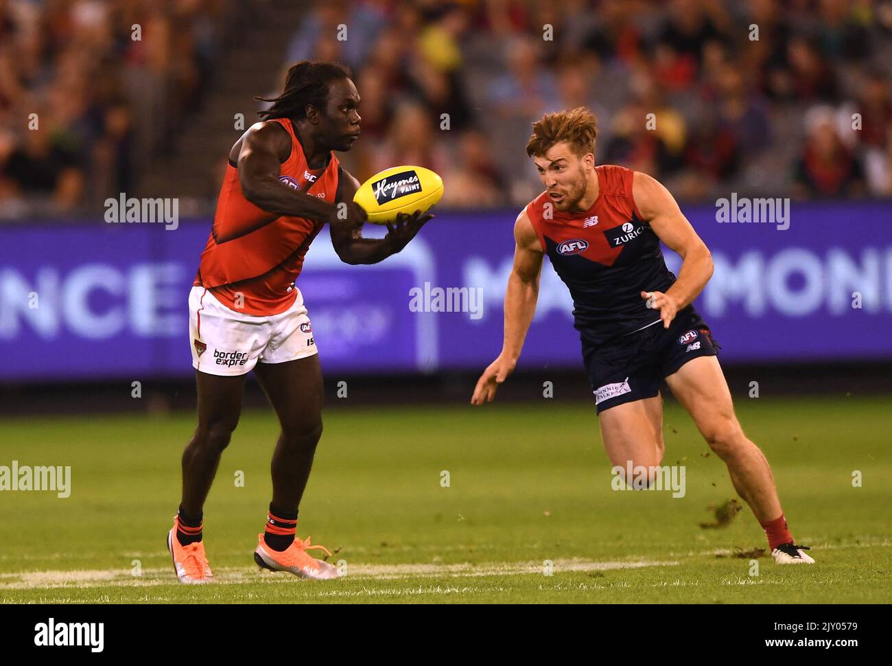 Anthony McDonald-Tipungwuti of the Bombers (left) and Jack Viney of the ...
