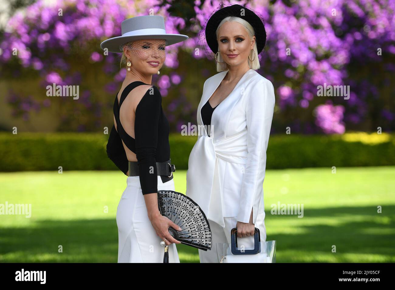 Stacey Roberts and Millicent van der Velde pose for a photograph during ...