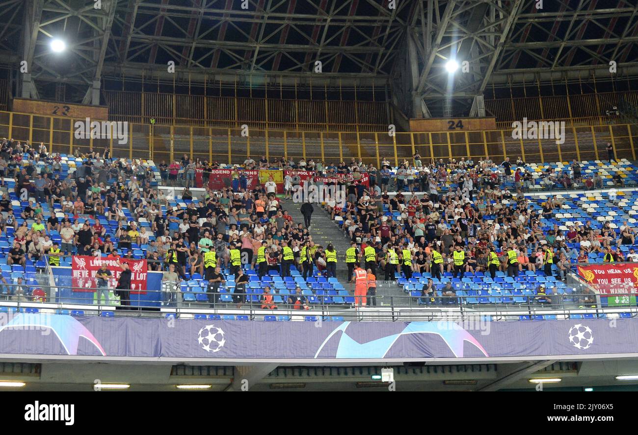 Liverpool fans guarded by stewards high up in the stands before the ...