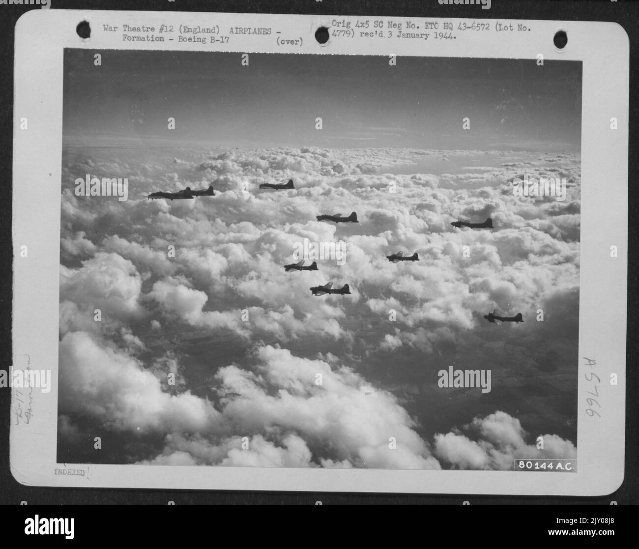 Formations Of Boeing B-17 "Flying Fortresses"Fly Above A Cloud ...