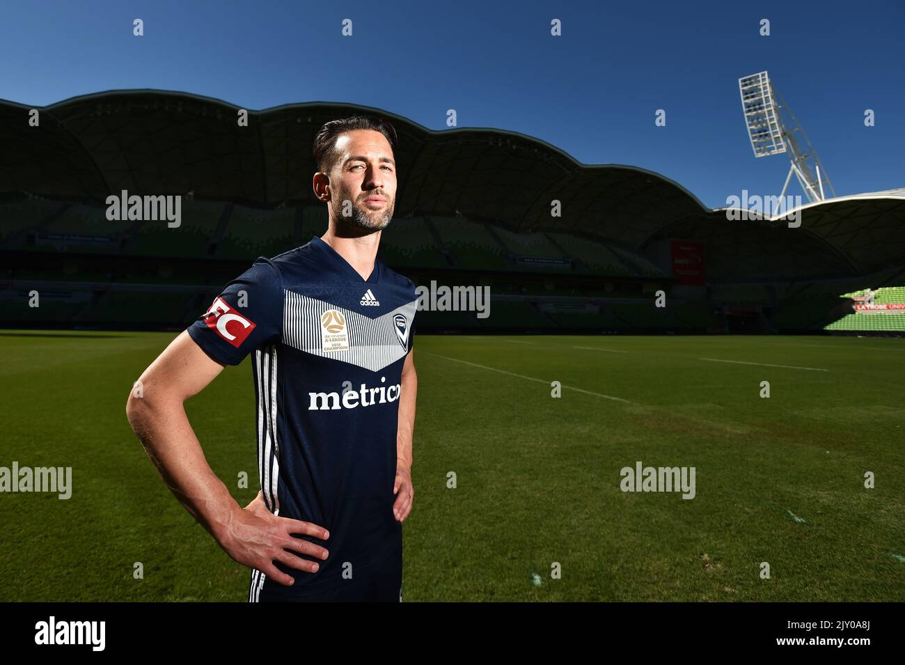 Carl Valeri poses for a photograph on the field at AAMI Park in ...