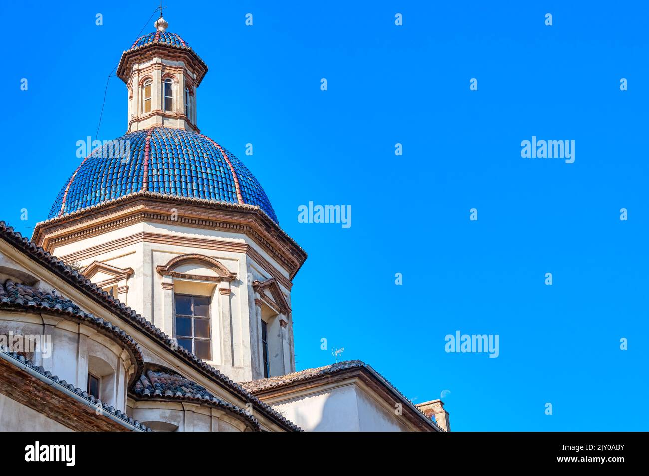 Old Catholic colonial church of San Sebastian y San Miguel. Blue tiles ...