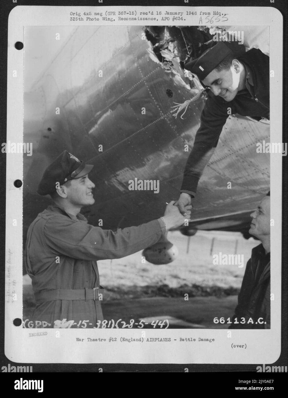 A Lieutenant Of The 381St Bomb Group Inside A Boeing B-17 Reaches Out ...