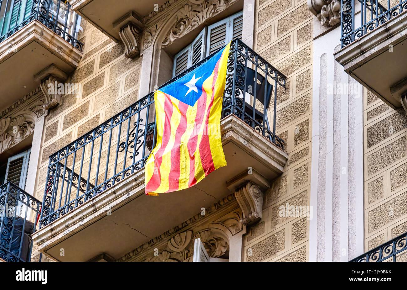 Flag of Barcelona on a balcony of an apartment building Stock Photo - Alamy