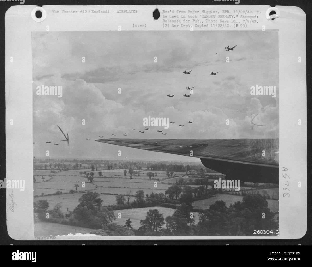 Liberators, easily identified by their twin rudders, fly low over the ...