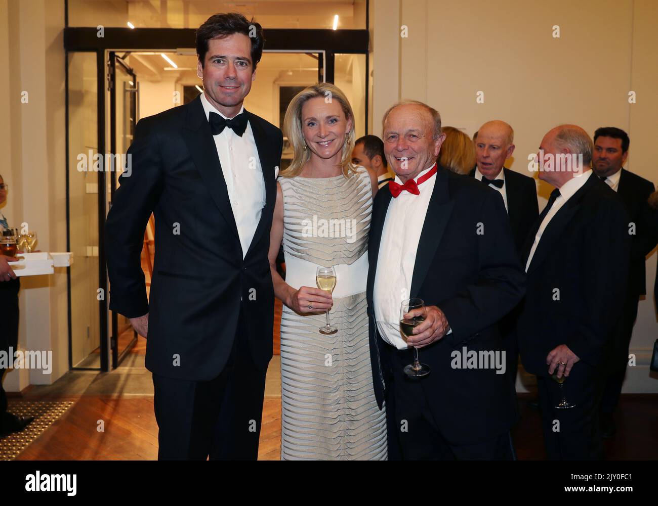 (L-R) AFL CEO Gillon McLachlan, his wife Laura and Gerry Harvey at the ...