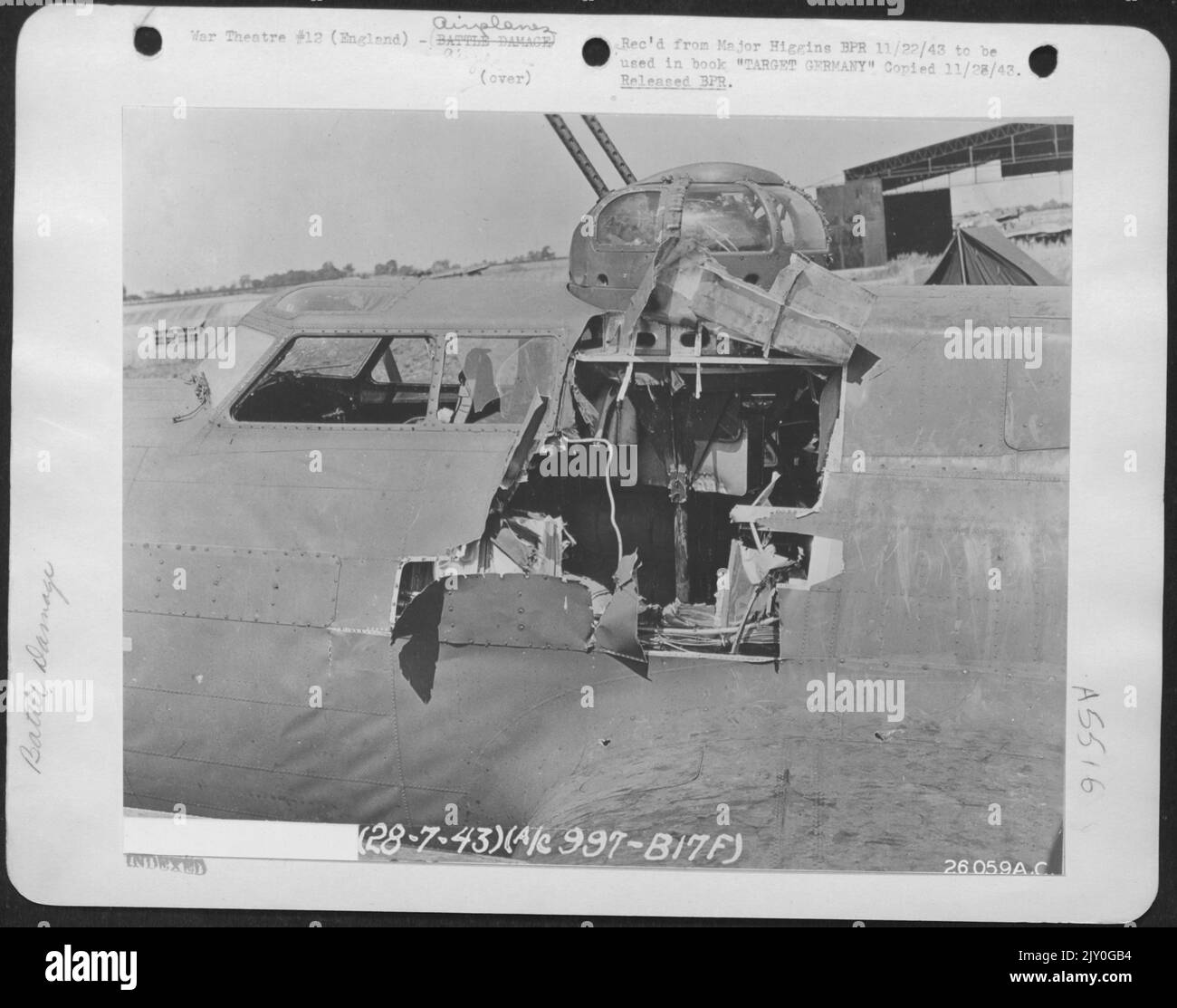 Hole made by AA shell fragments shown in plane called "SACK Stock Photo ...