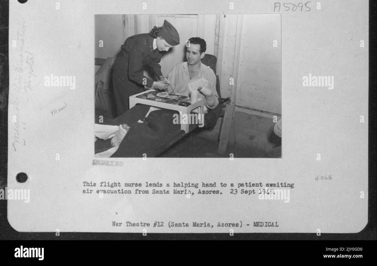 The Flight Nurse Lends A Helping Hand To A Patient Awaiting Air ...