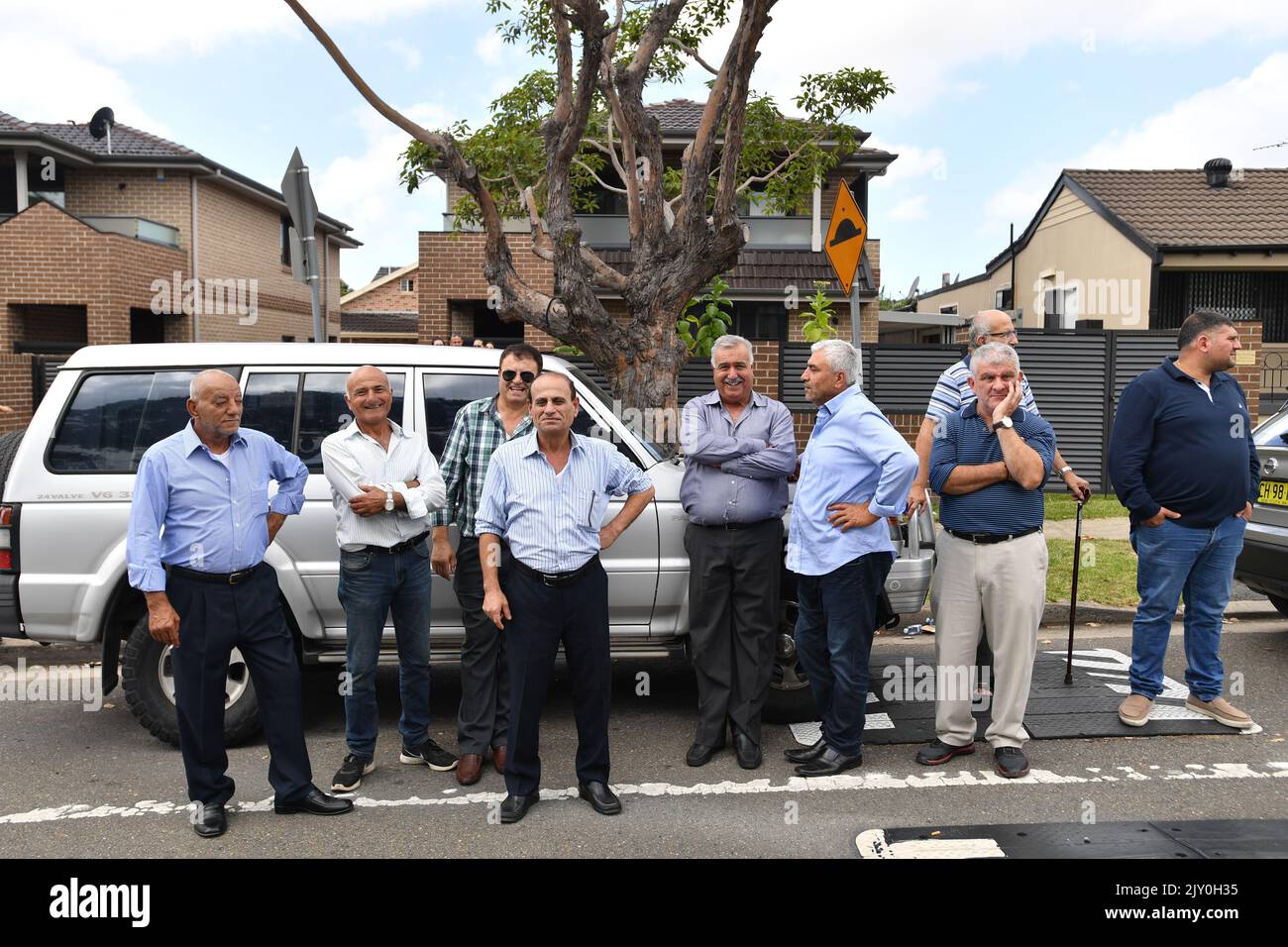 Worshippers wait for Prime Minister Scott Morrison and wife Jenny at ...