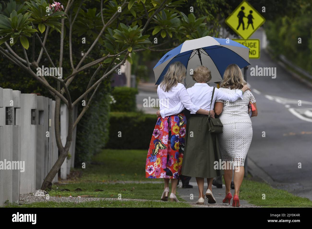 Former Australian Governor-General Dame Quentin Bryce, (centre) walks ...