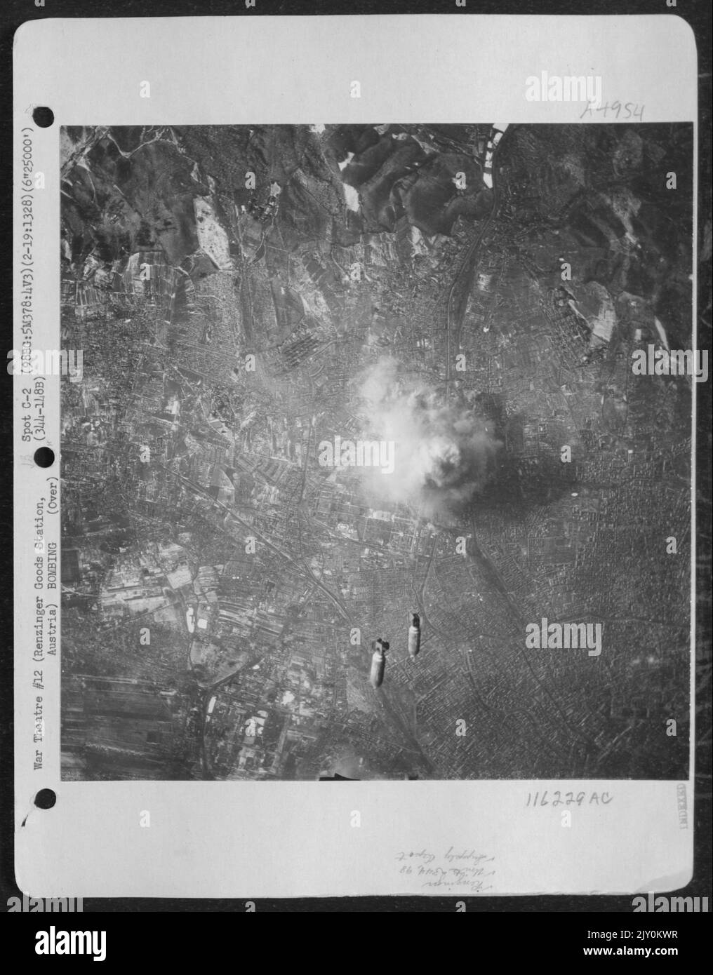 More Bombs Fall Toward The Target As Smoke Rises Form The Renzinger ...