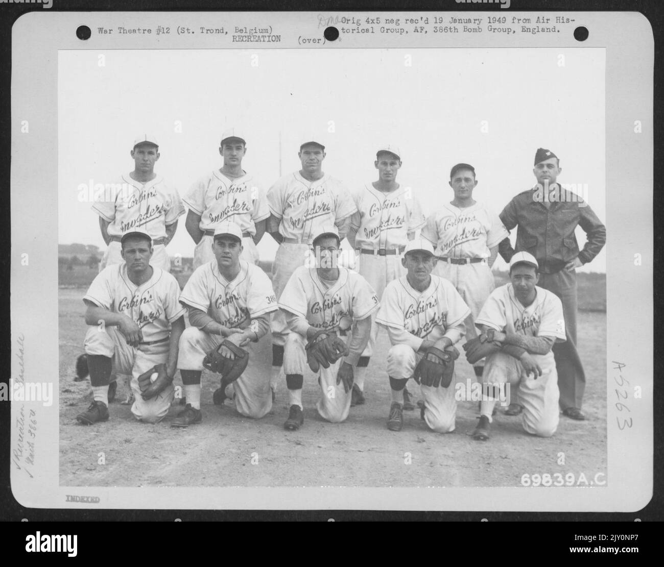 Men Belonging To The 386Th Bomb Group Baseball Team Pose At Their Base ...