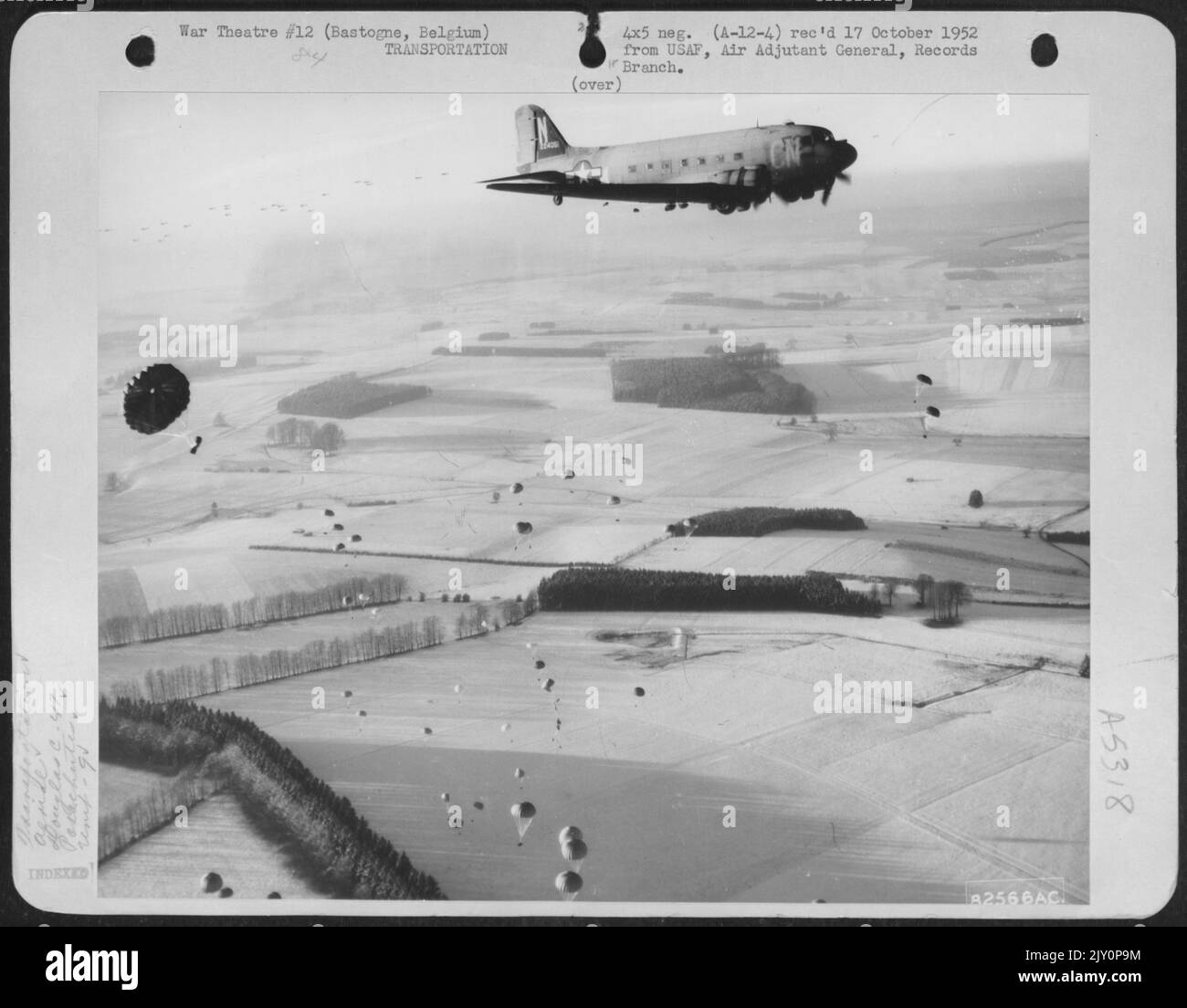 A Douglas C-47 Of The 9Th Troop Carrier Command Drop Supplies Over ...
