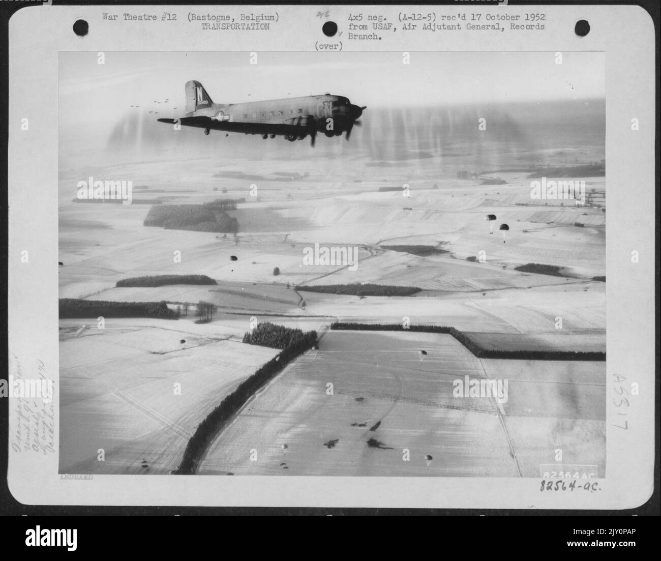 A Douglas C-47 Of The 9Th Troop Carrier Command Drop Supplies Over ...