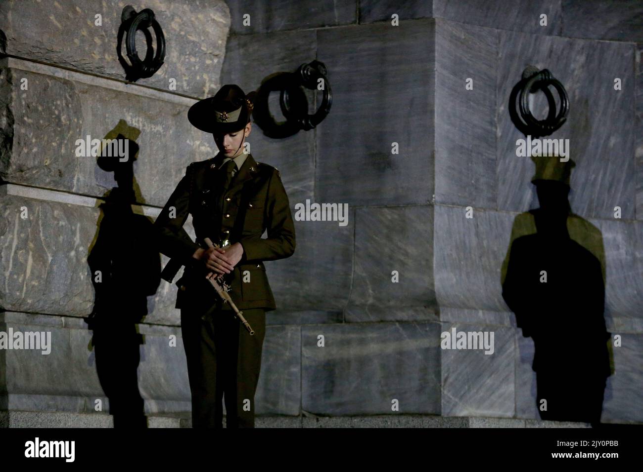 The catafalque party is seen during the Anzac day dawn service at the ...