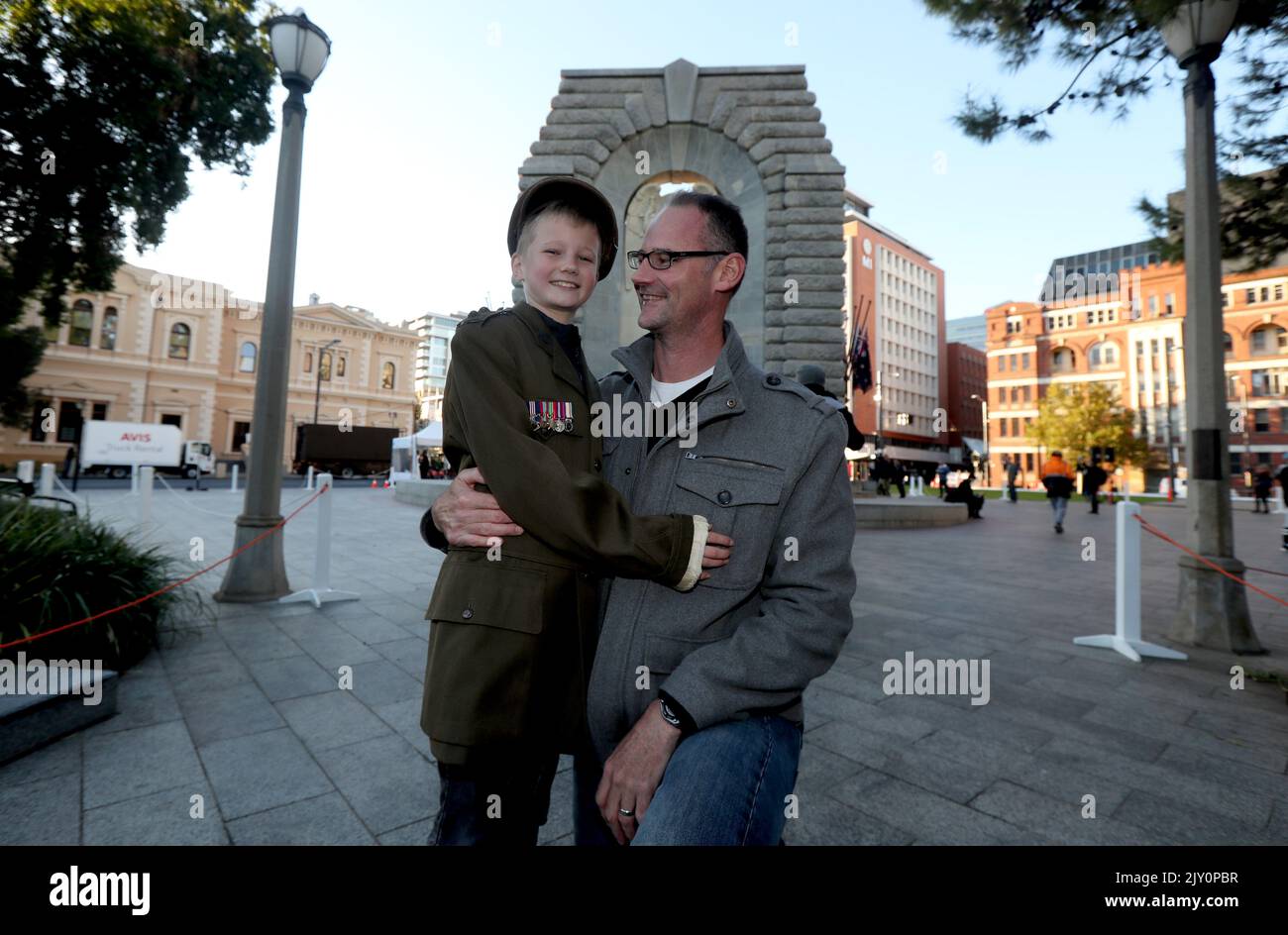 Caelan Ryan, 9, with his dad Damian Ryan, wears his great grandfathers ...