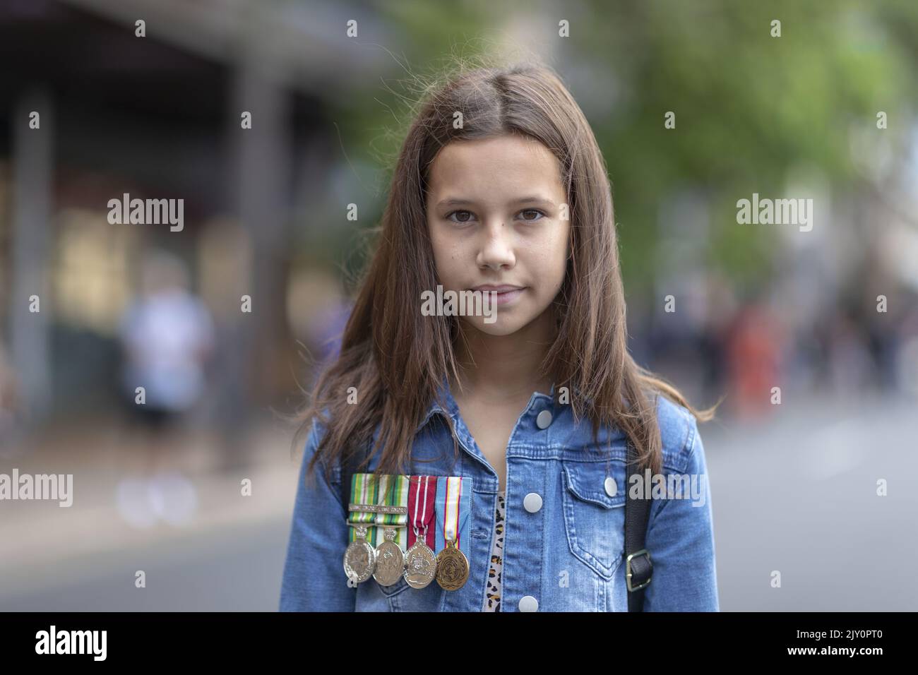 Chloe Radosevich poses with her father's war medals during the Anzac ...
