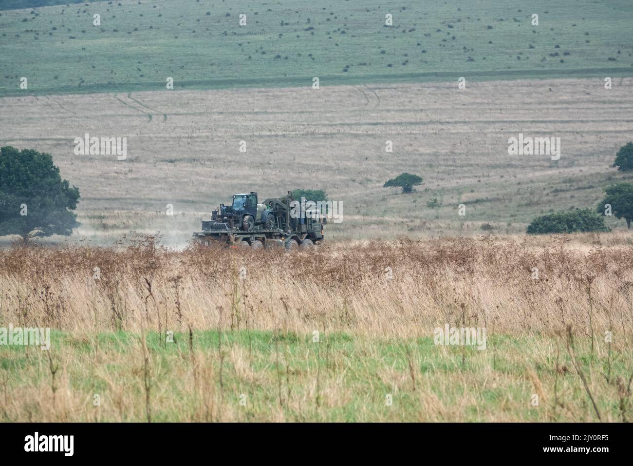 British army MAN SV HX77 8x8 EPLS Heavy Utility Trucks in action on a ...