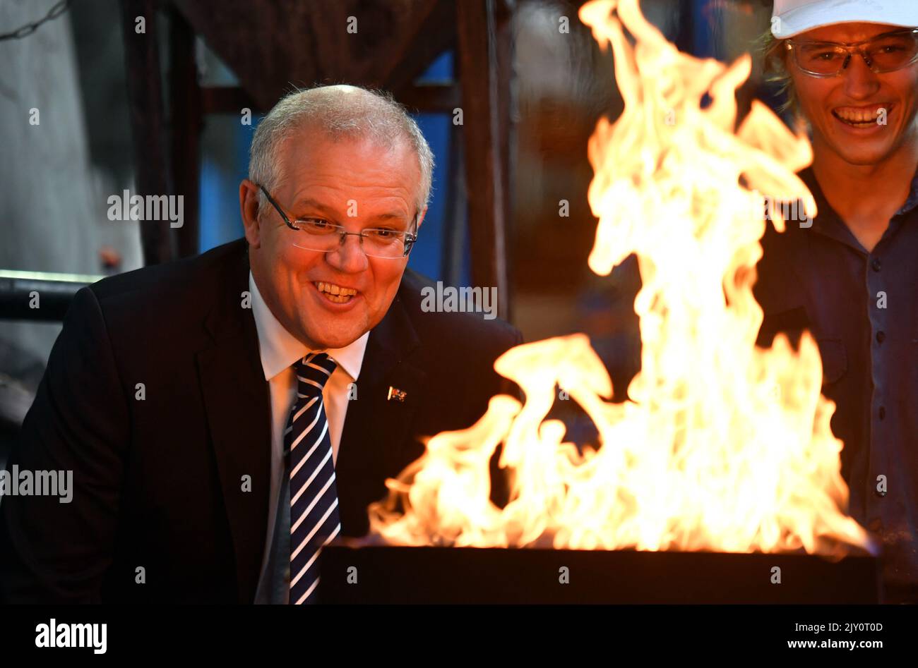 Prime Minister Scott Morrison watches burn roller at a visit to ...