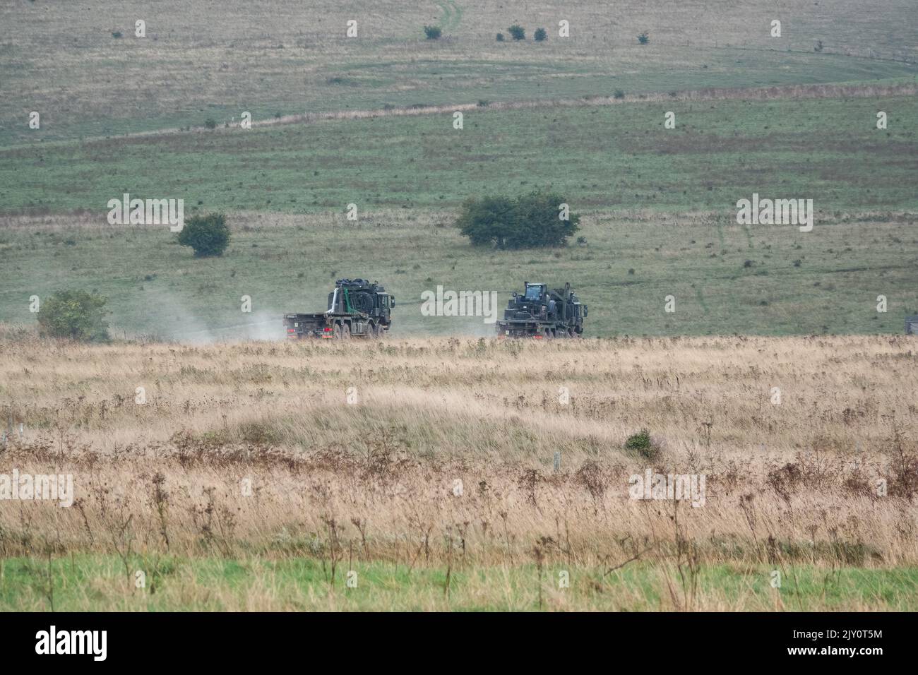British army MAN SV HX77 8x8 EPLS Heavy Utility Trucks in action on a ...