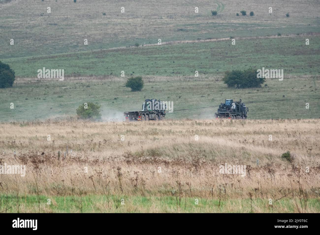 British army MAN SV HX77 8x8 EPLS Heavy Utility Trucks in action on a ...