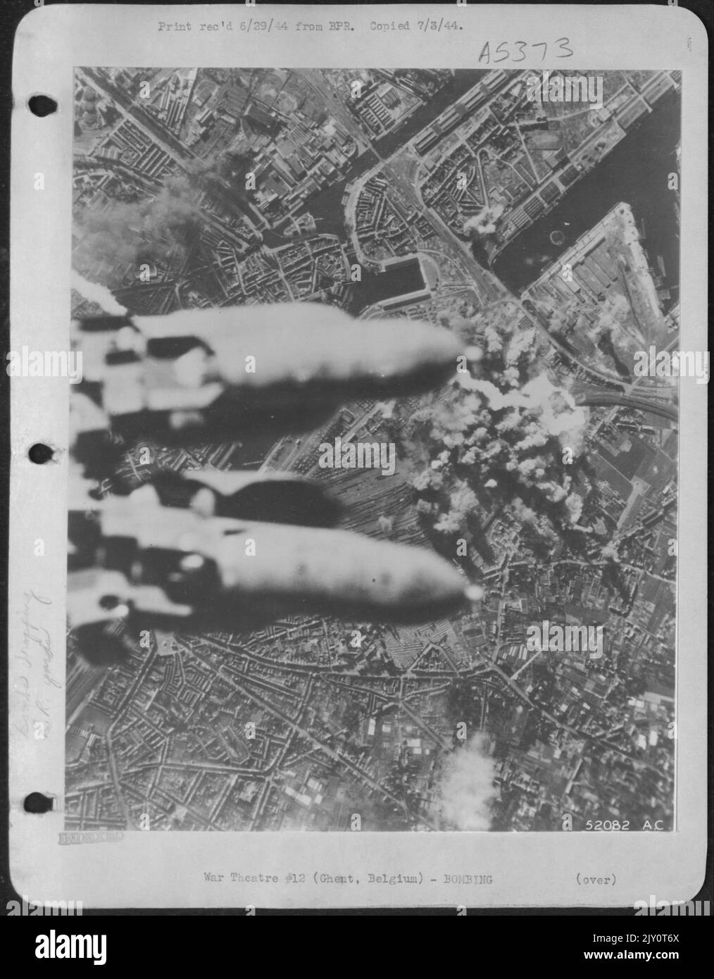 Almost hiding the target from view, bombs from attacking U.S. 8th AAF ...