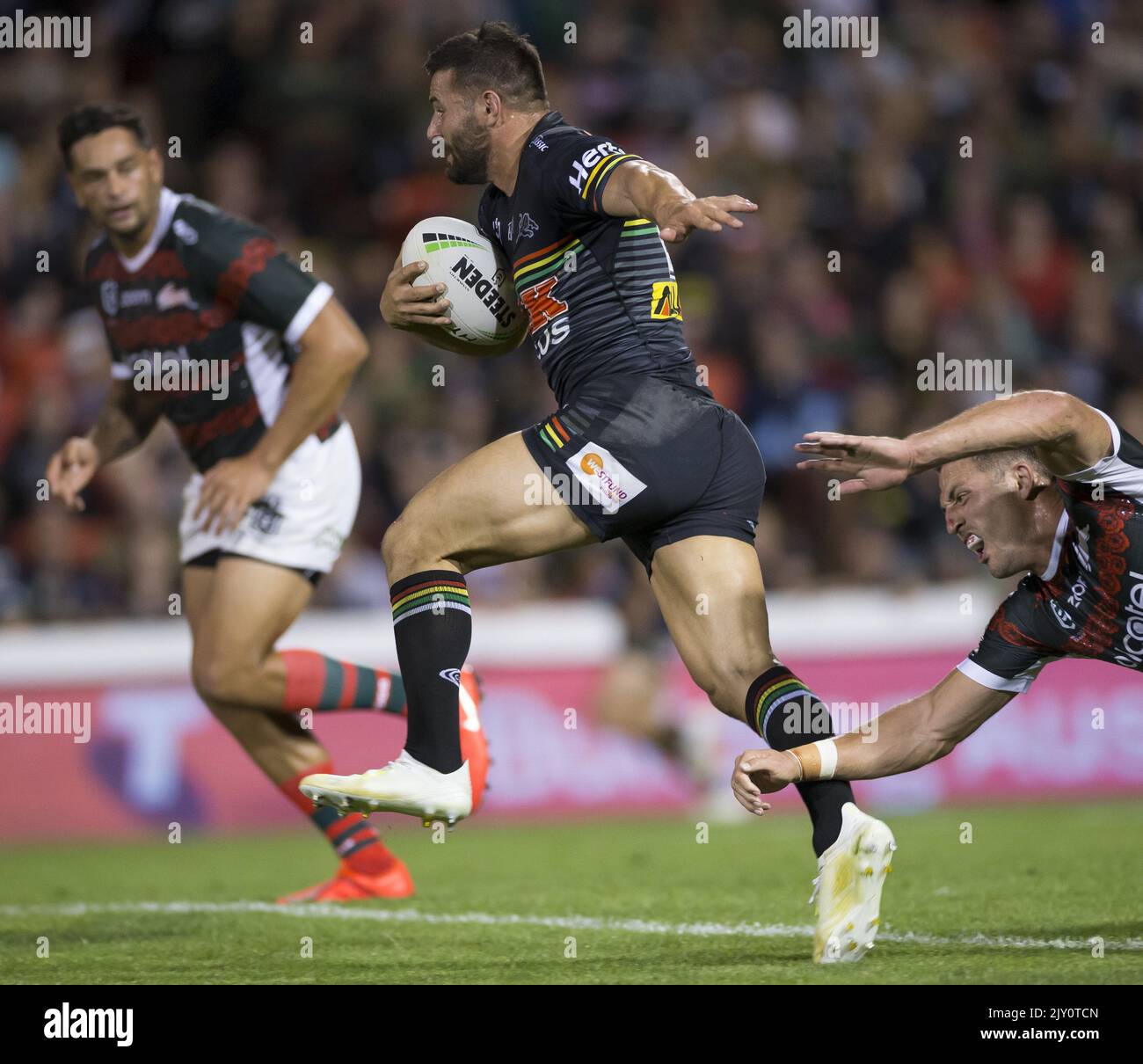 Josh Mansour of the Panthers makes a break during the Round 7 NRL match ...