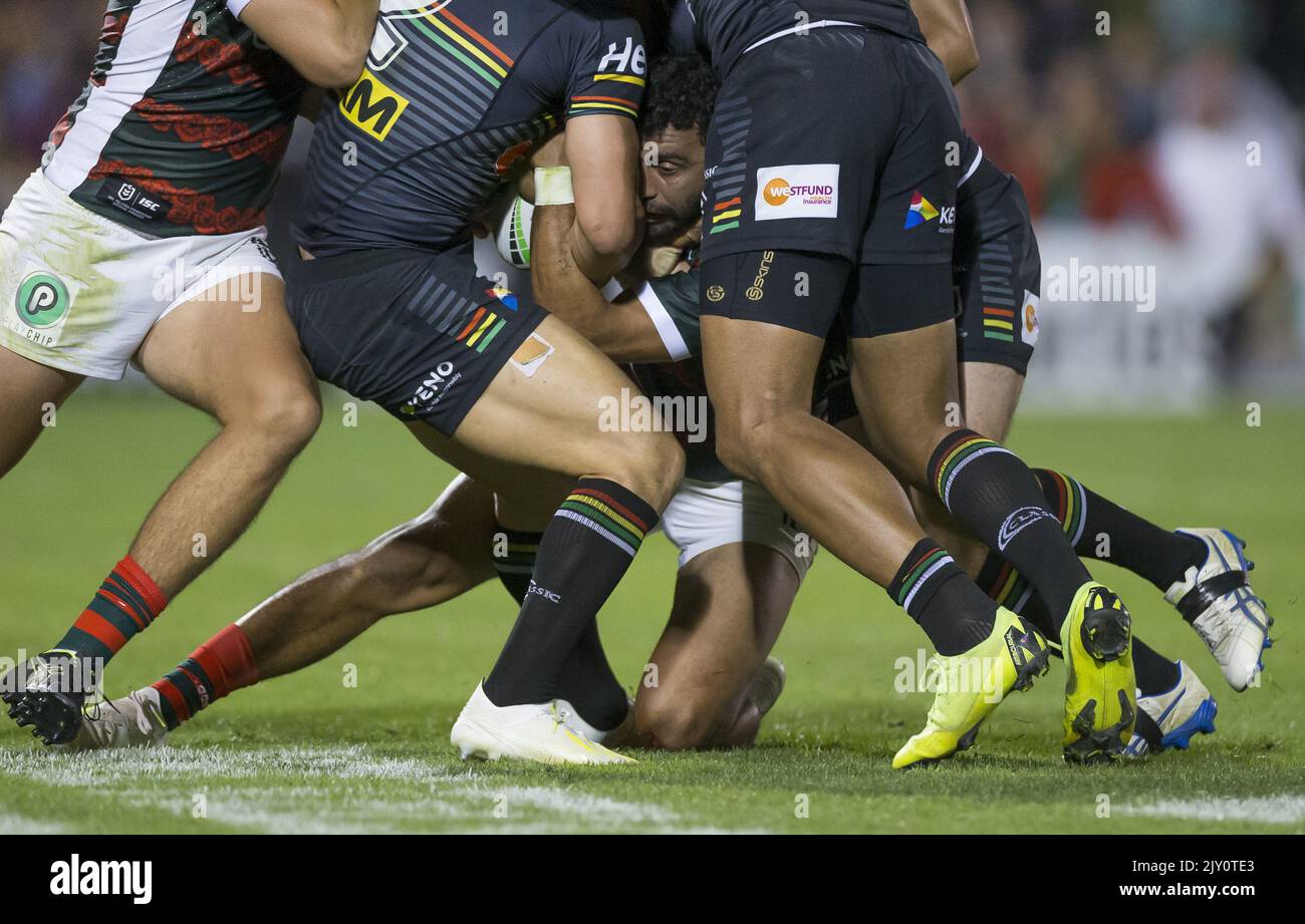 Alexander Johnston of the Rabbitohs is tackled during the Round 7 NRL ...