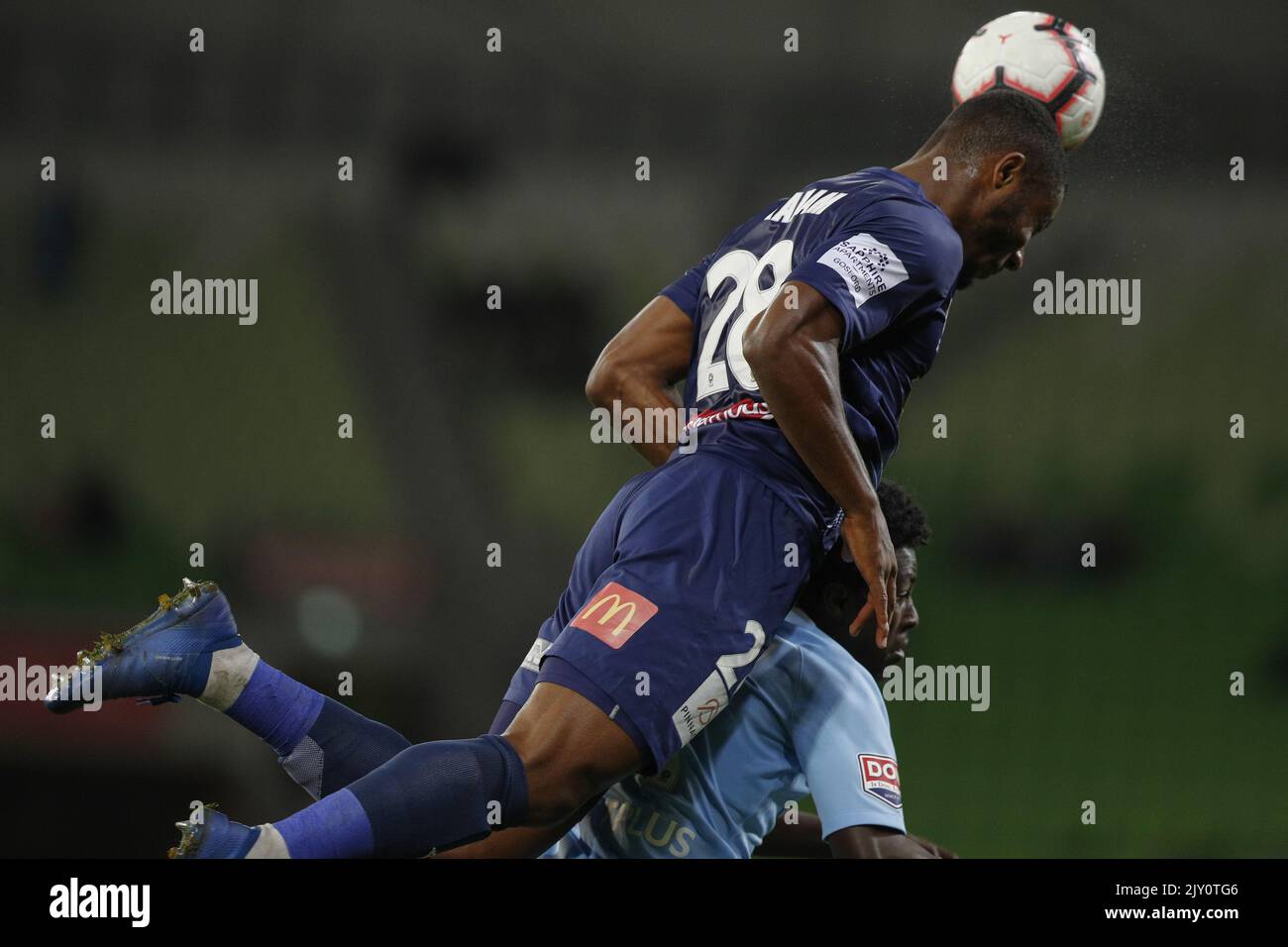 Samuel Graham of the Mariners heads the ball during the Round 27 A ...
