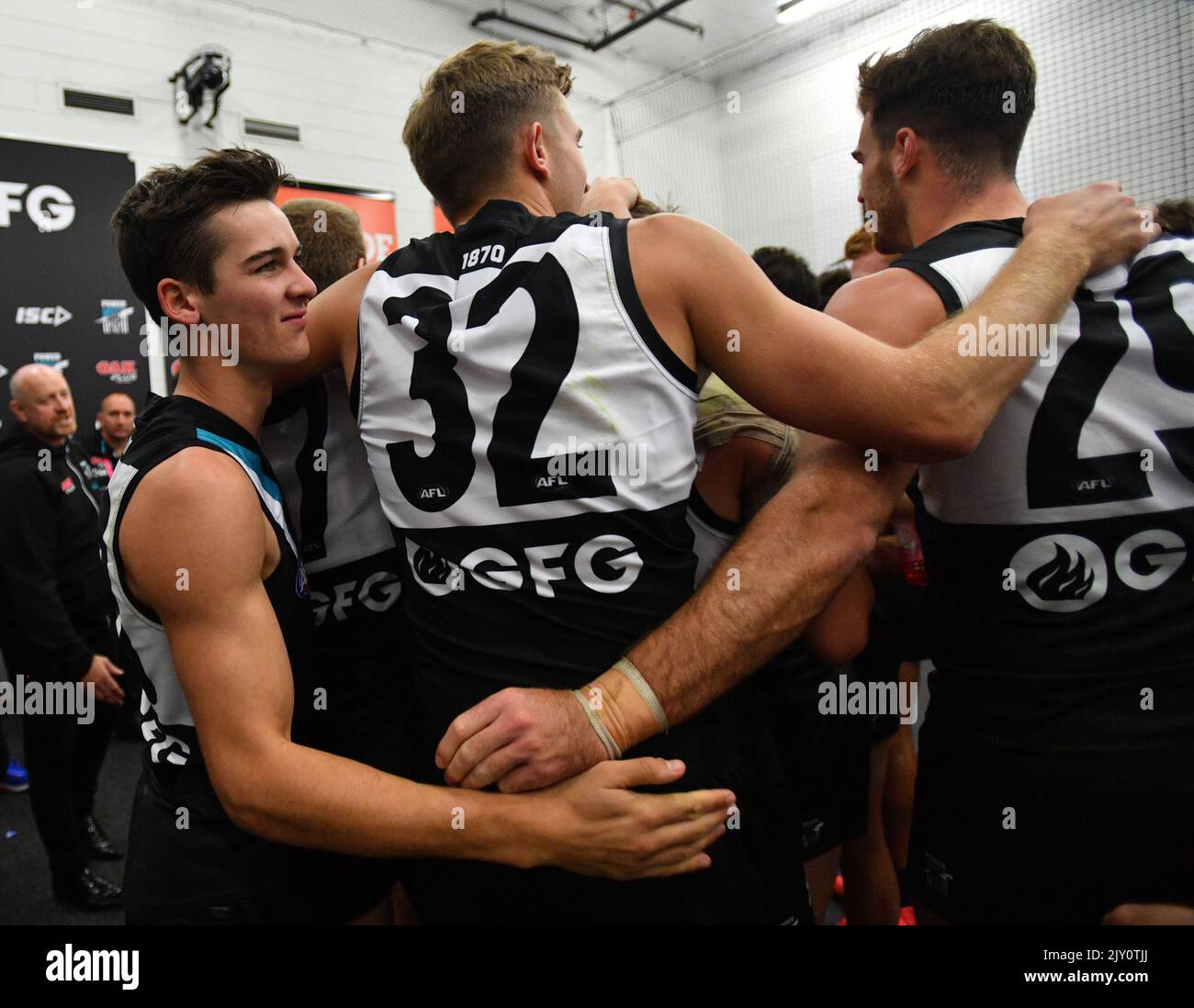 Connor Razee of the Power (L) celebrates in the change rooms after the ...