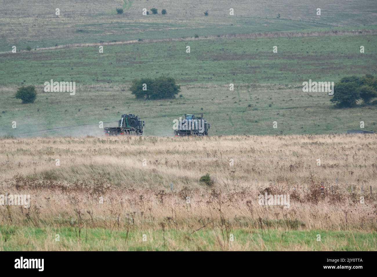 British army MAN SV HX77 8x8 EPLS Heavy Utility Trucks in action on a ...