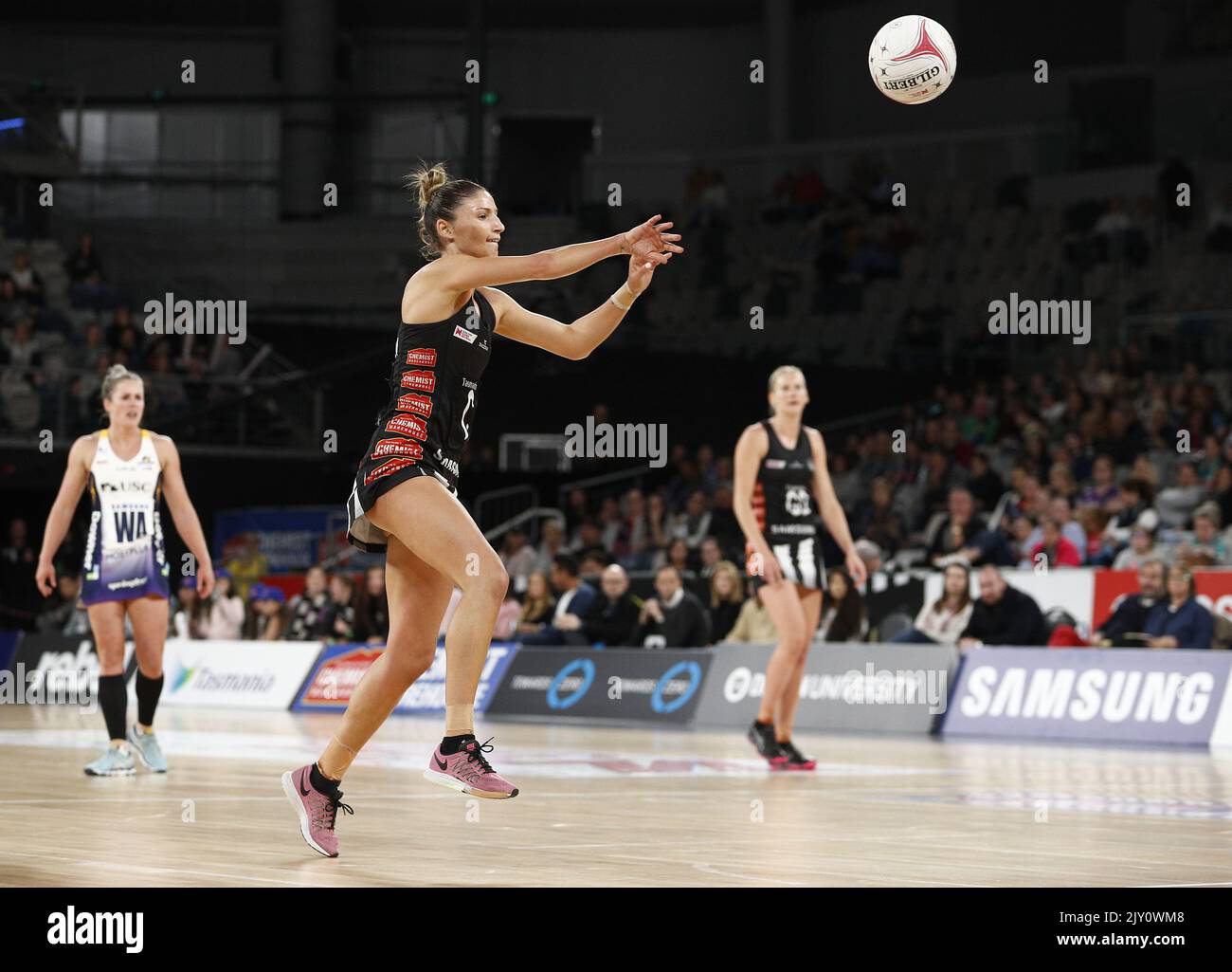 Kim Ravaillion of the Magpies passes the ball during the Round 1 Super ...