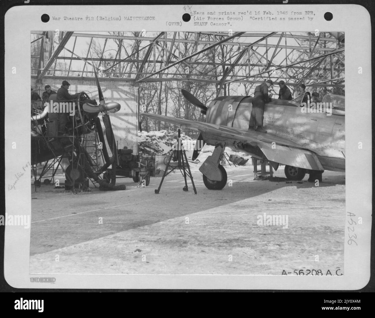 Aircraft mechanics repair engine Black and White Stock Photos & Images ...