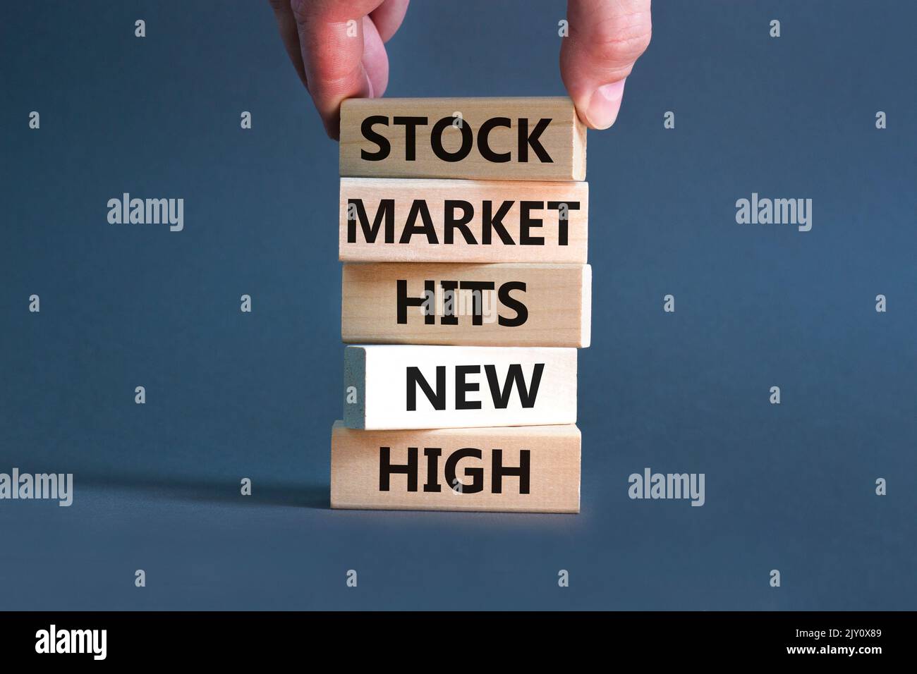Stock market hits new high symbol. Concept words Stock market hits new ...