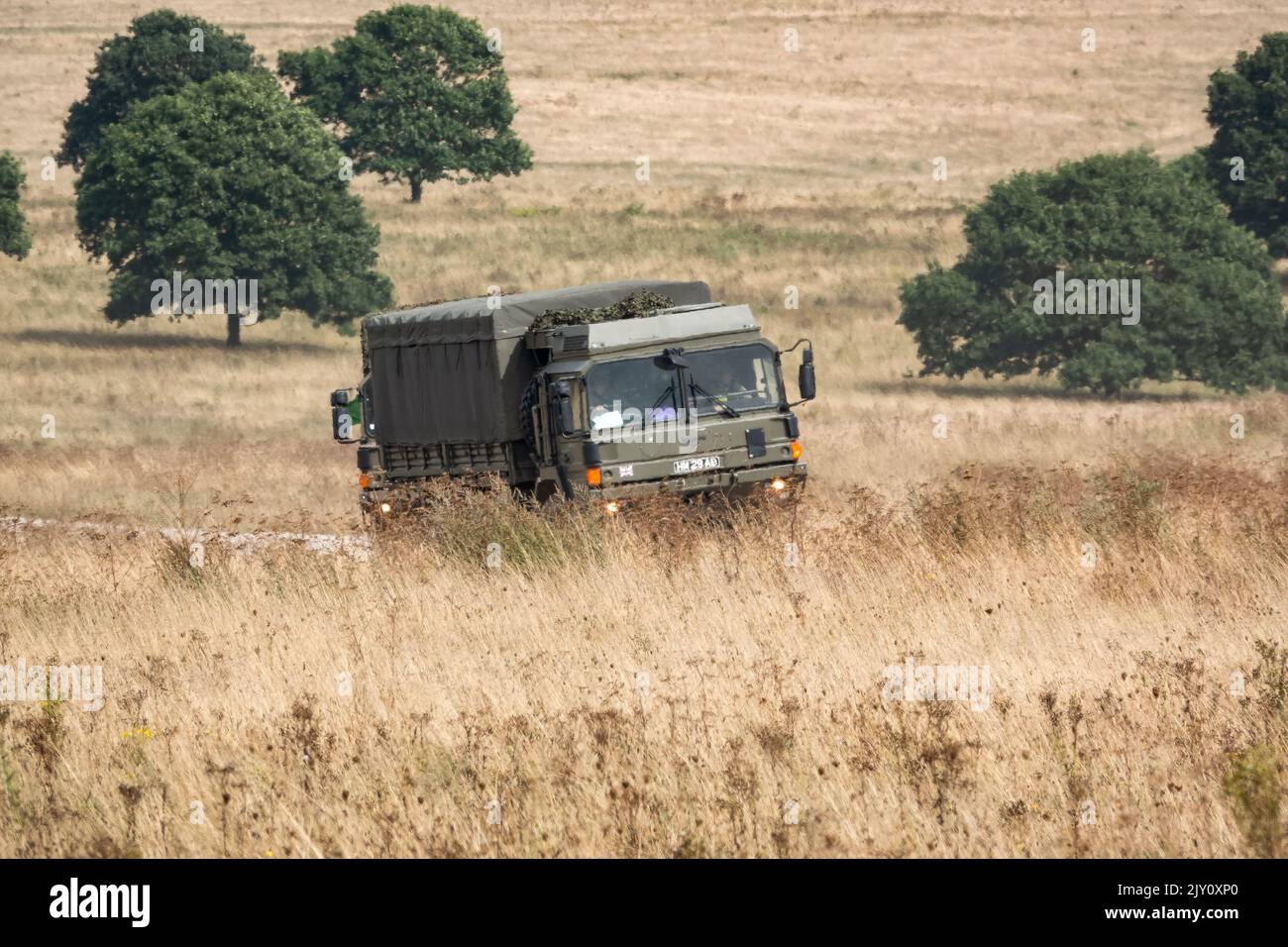British army MAN HX60 4x4 Heavy Utility Truck in action on a military ...