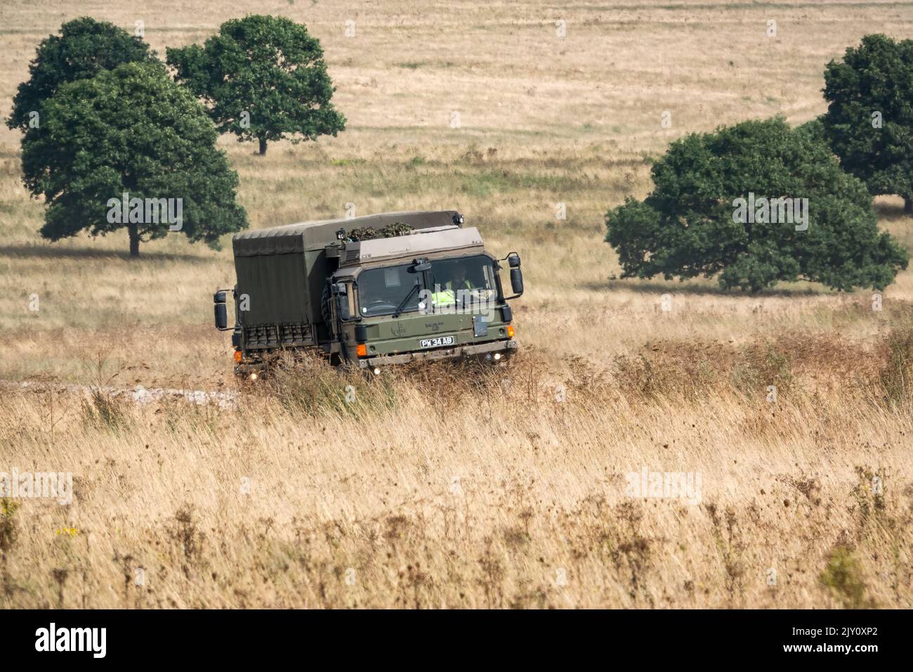 British army MAN HX60 4x4 Heavy Utility Truck in action on a military ...
