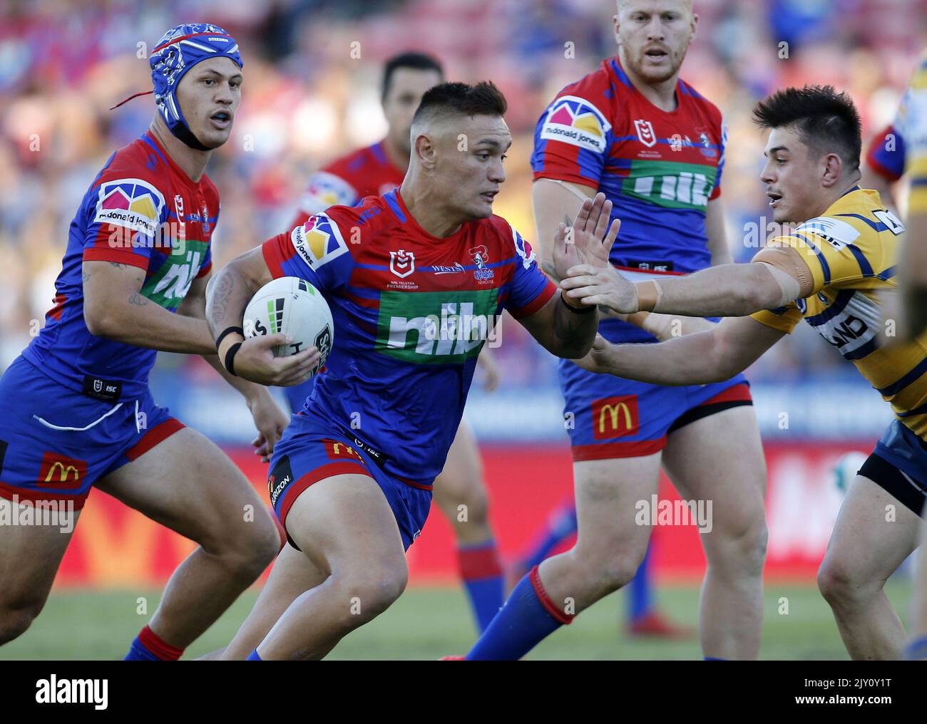 Daniel Levi of the Knights makes a dummy half run during the Round 7 ...