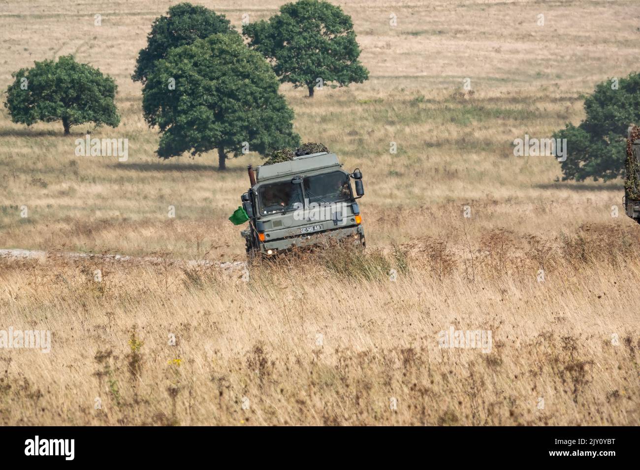 British army MAN HX60 4x4 Heavy Utility Truck in action on a military ...