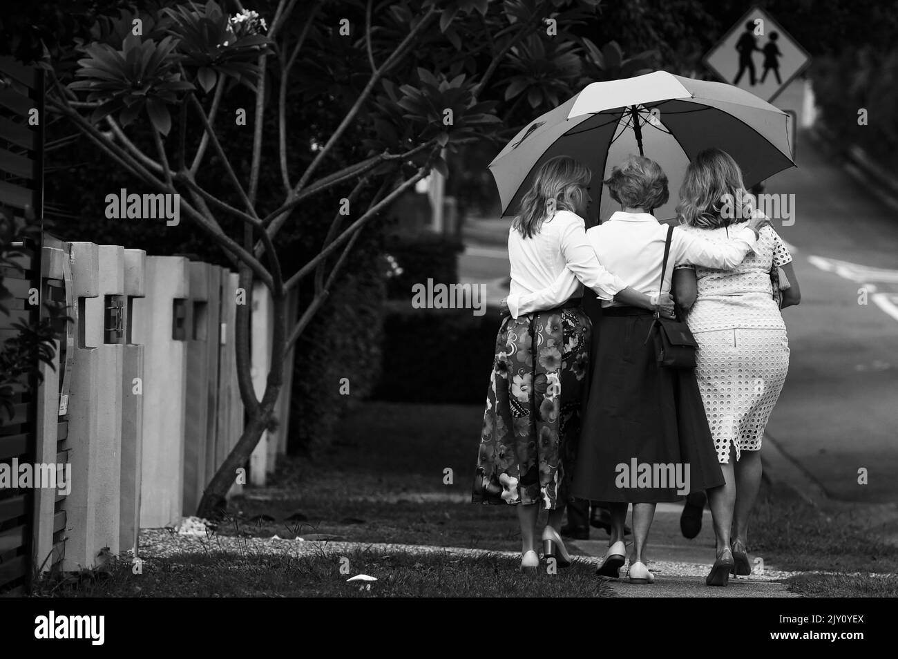 Former Australian Governor-General Dame Quentin Bryce, (centre) walks ...