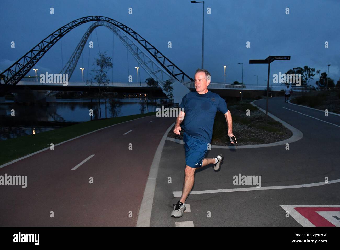 Australian Opposition Leader Bill Shorten is seen jogging past the ...